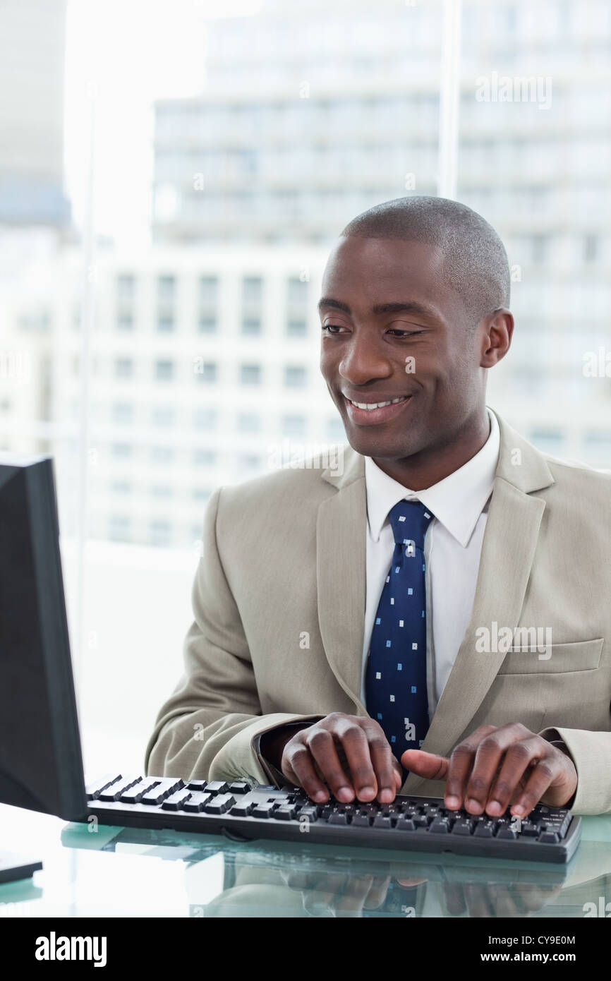 Portrait of an office worker using a computer Stock Photo - Alamy