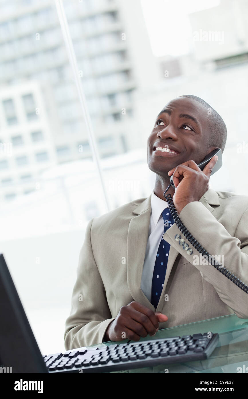 Portrait of an office worker on the phone Stock Photo - Alamy