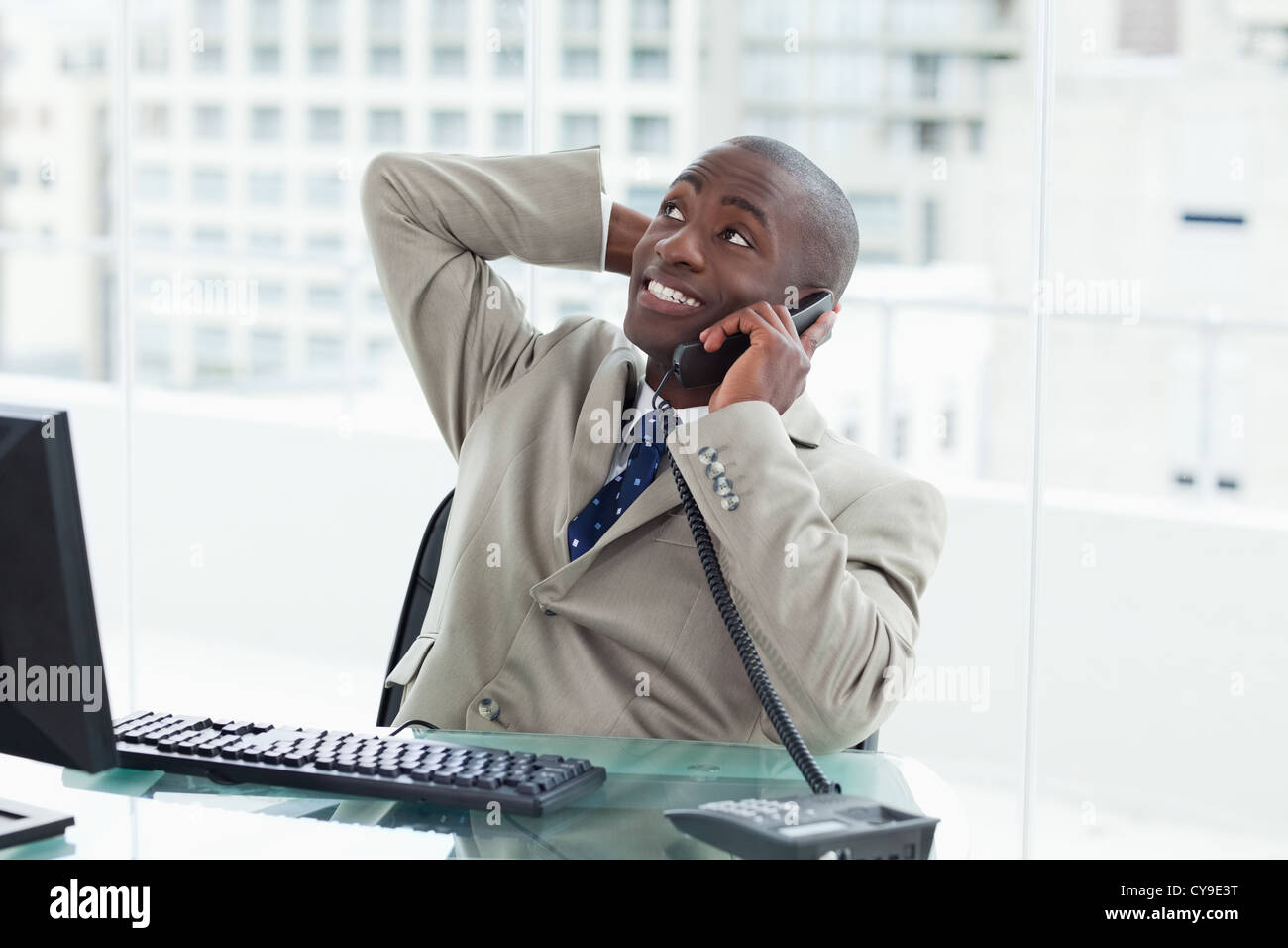 Office worker on the phone Stock Photo - Alamy