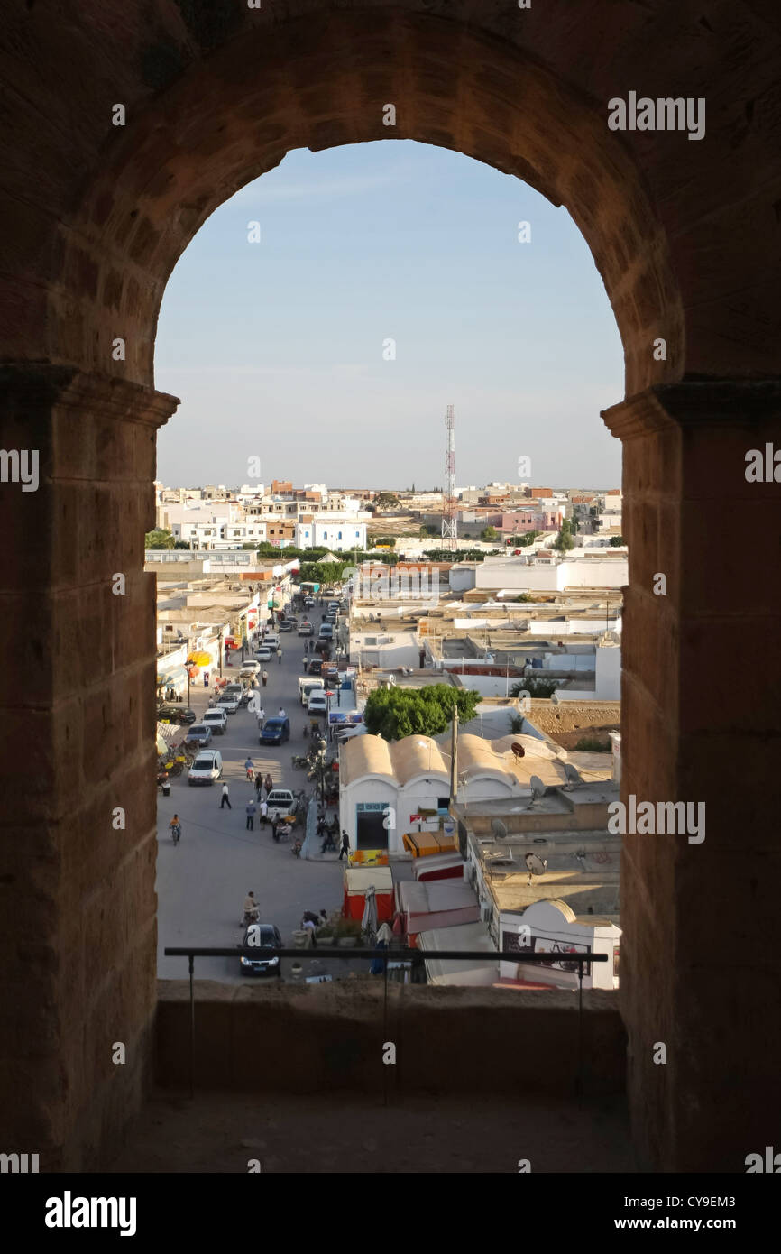 View of El Djam city skyline through the arches of amphitheatre ...