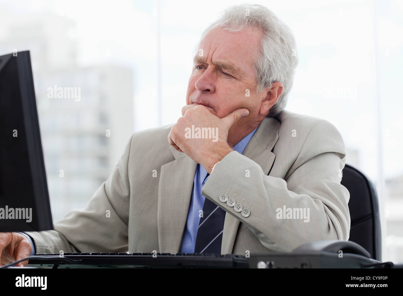 Thoughtful focused senior mature hi-res stock photography and images ...