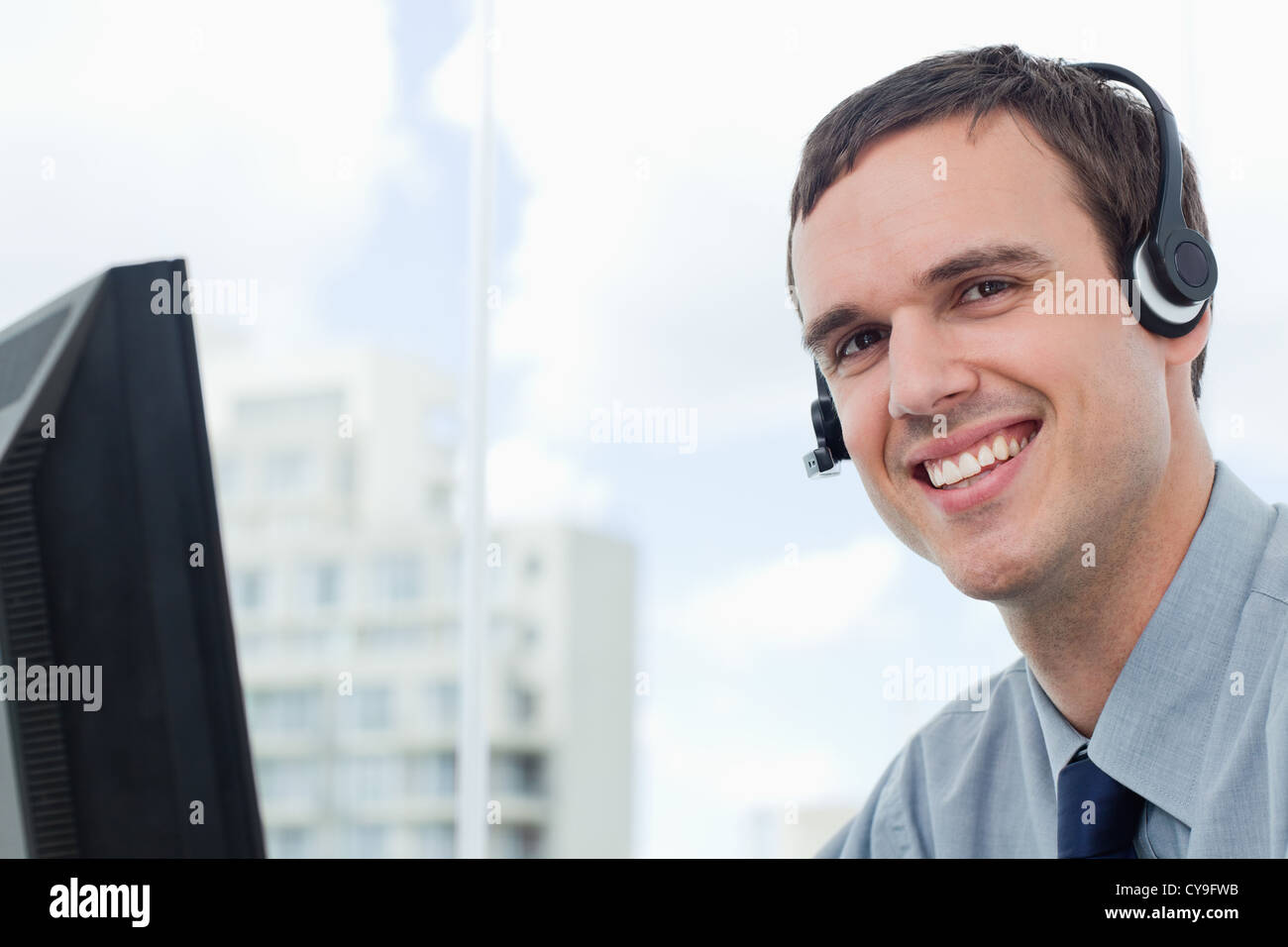 Happy male office worker hi-res stock photography and images - Alamy