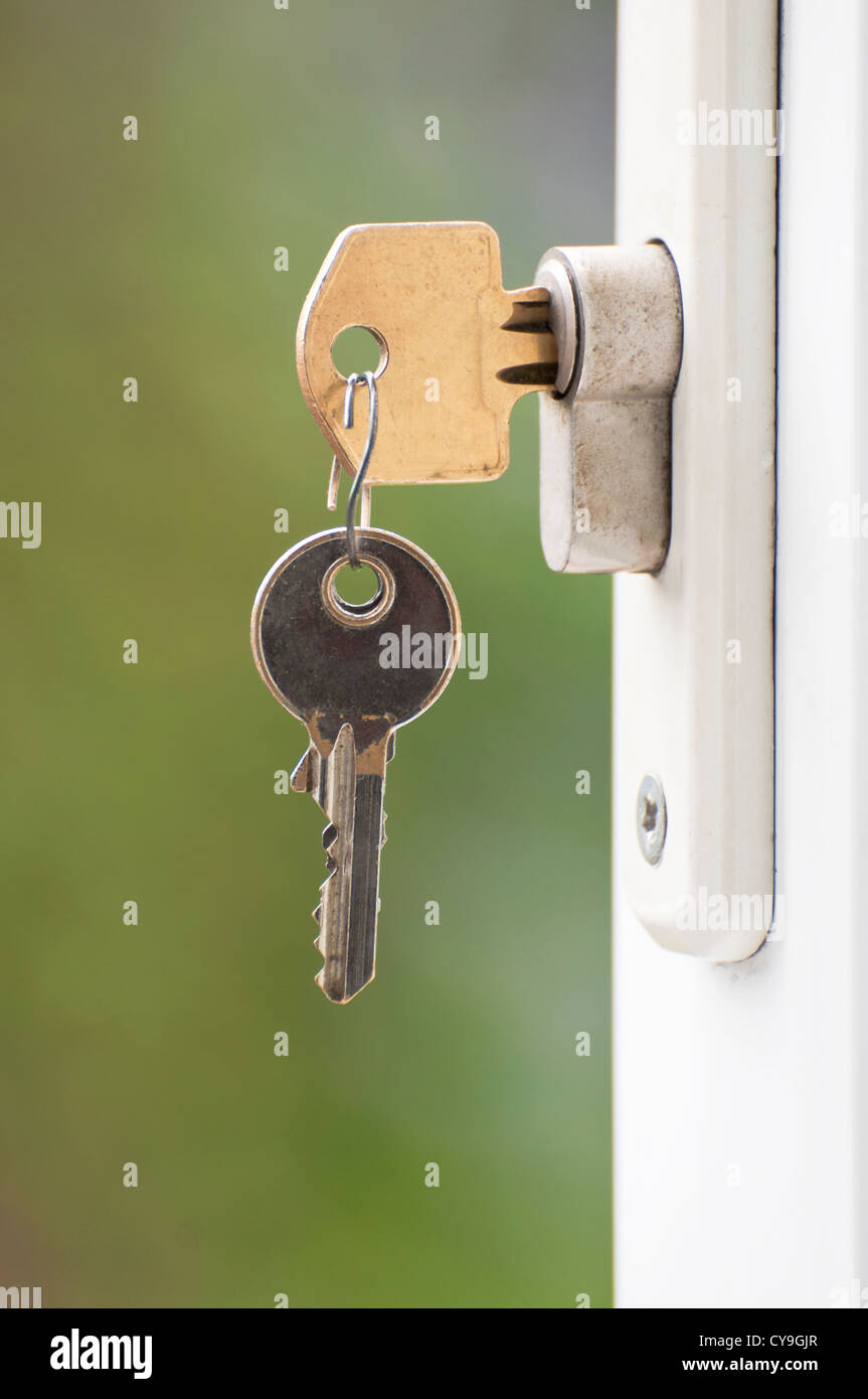 Door lock with keys Stock Photo - Alamy