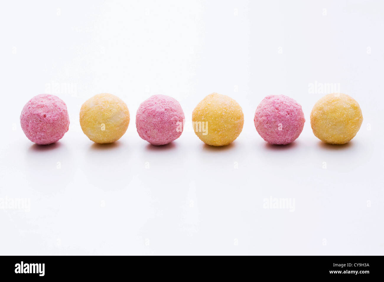 Champagne chocolate truffle pattern against a white background Stock ...