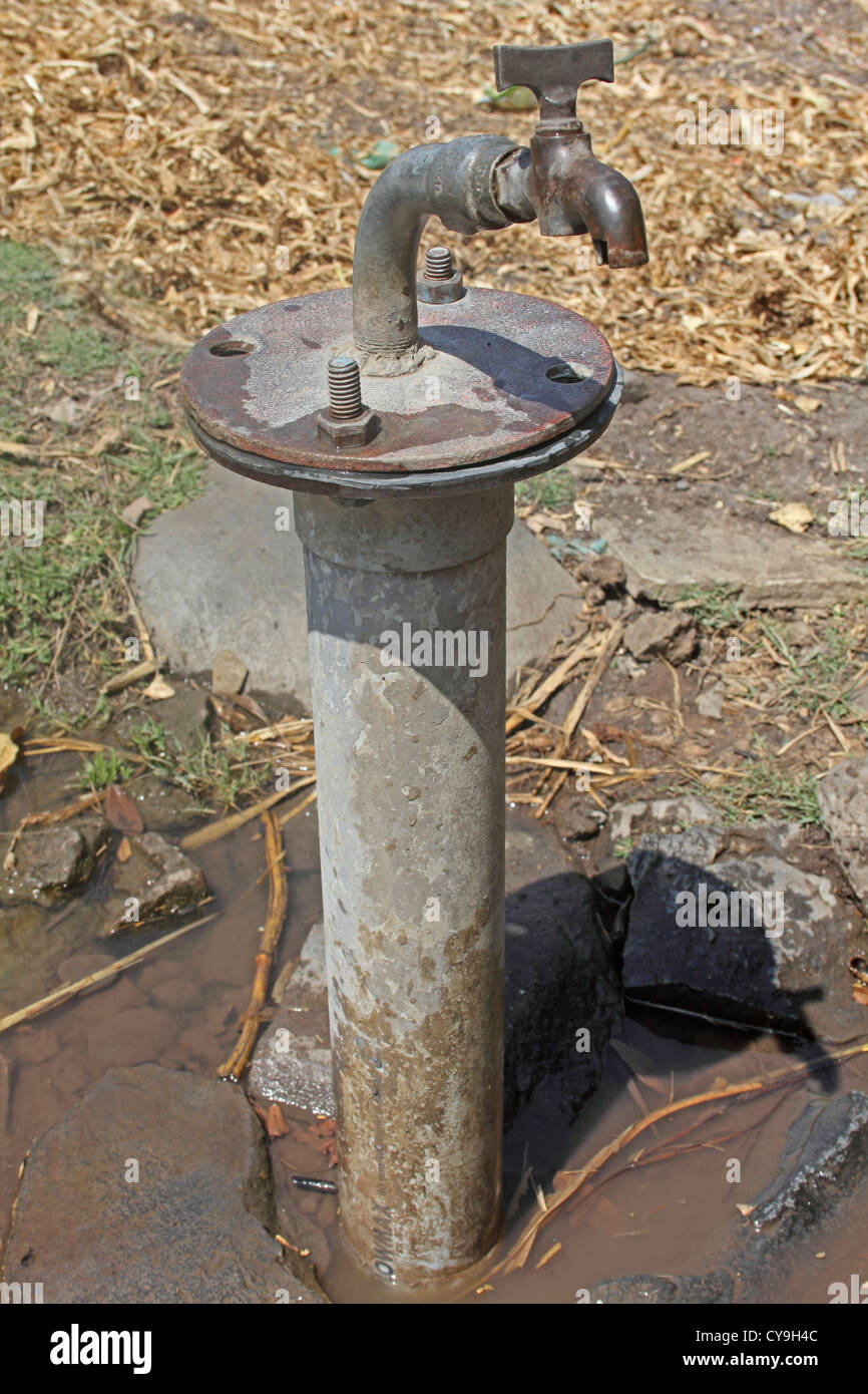 Community Water Tap Stock Photo - Alamy