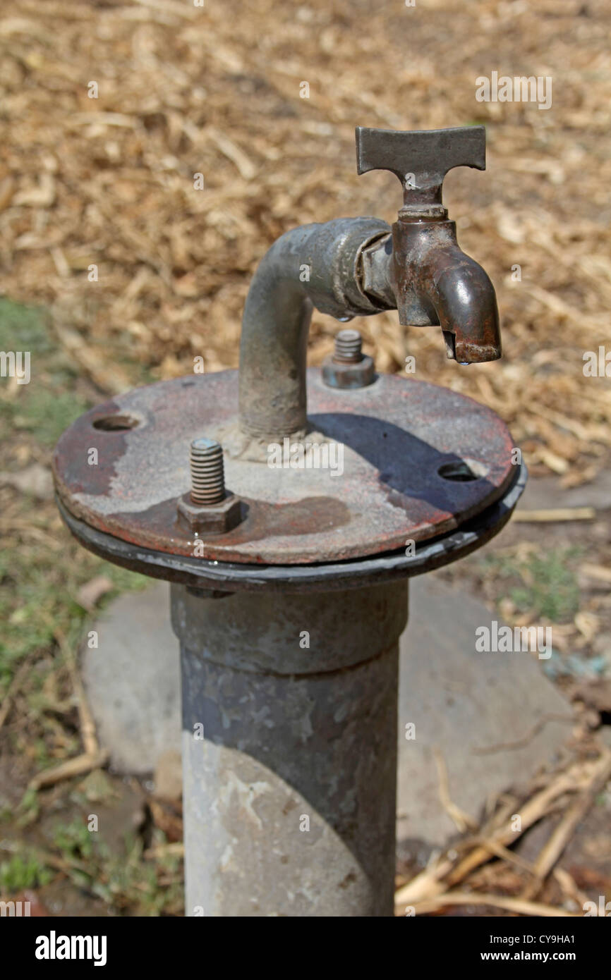 Community Water Tap Stock Photo - Alamy