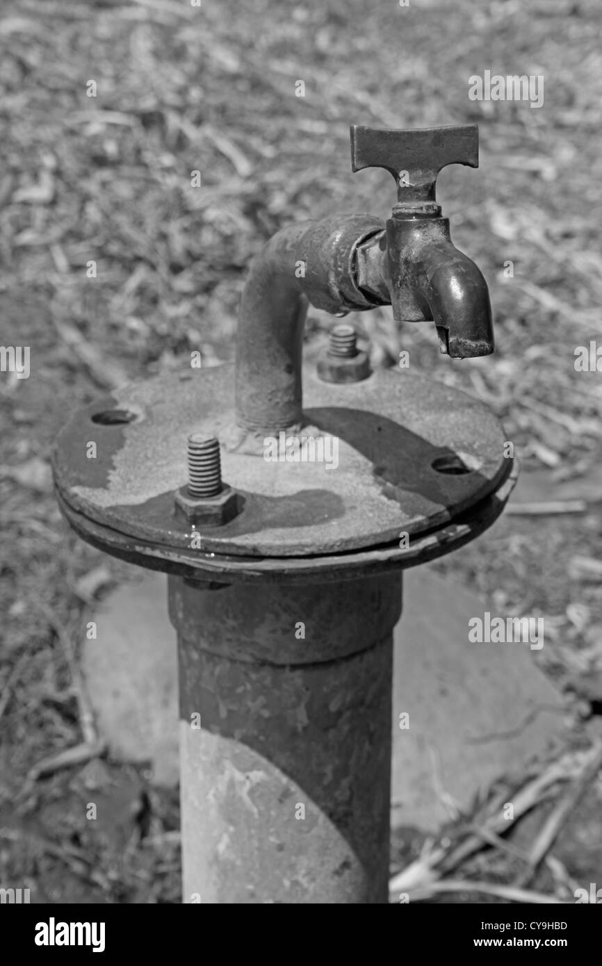 Community Water Tap Stock Photo - Alamy