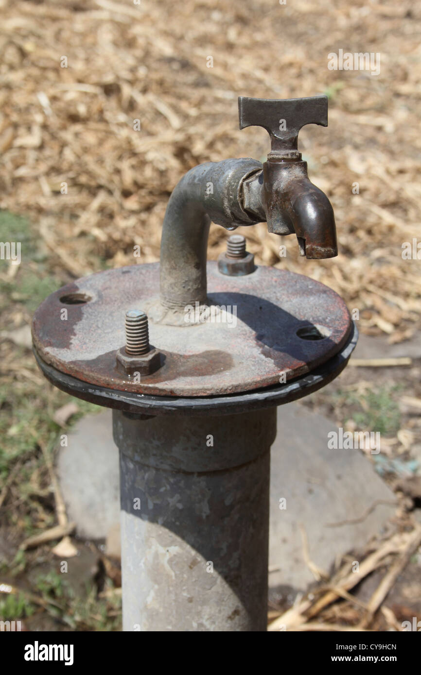 Community Water Tap Stock Photo - Alamy