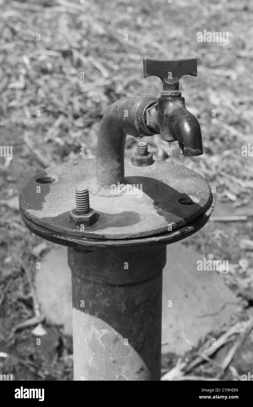Community Water Tap Stock Photo - Alamy