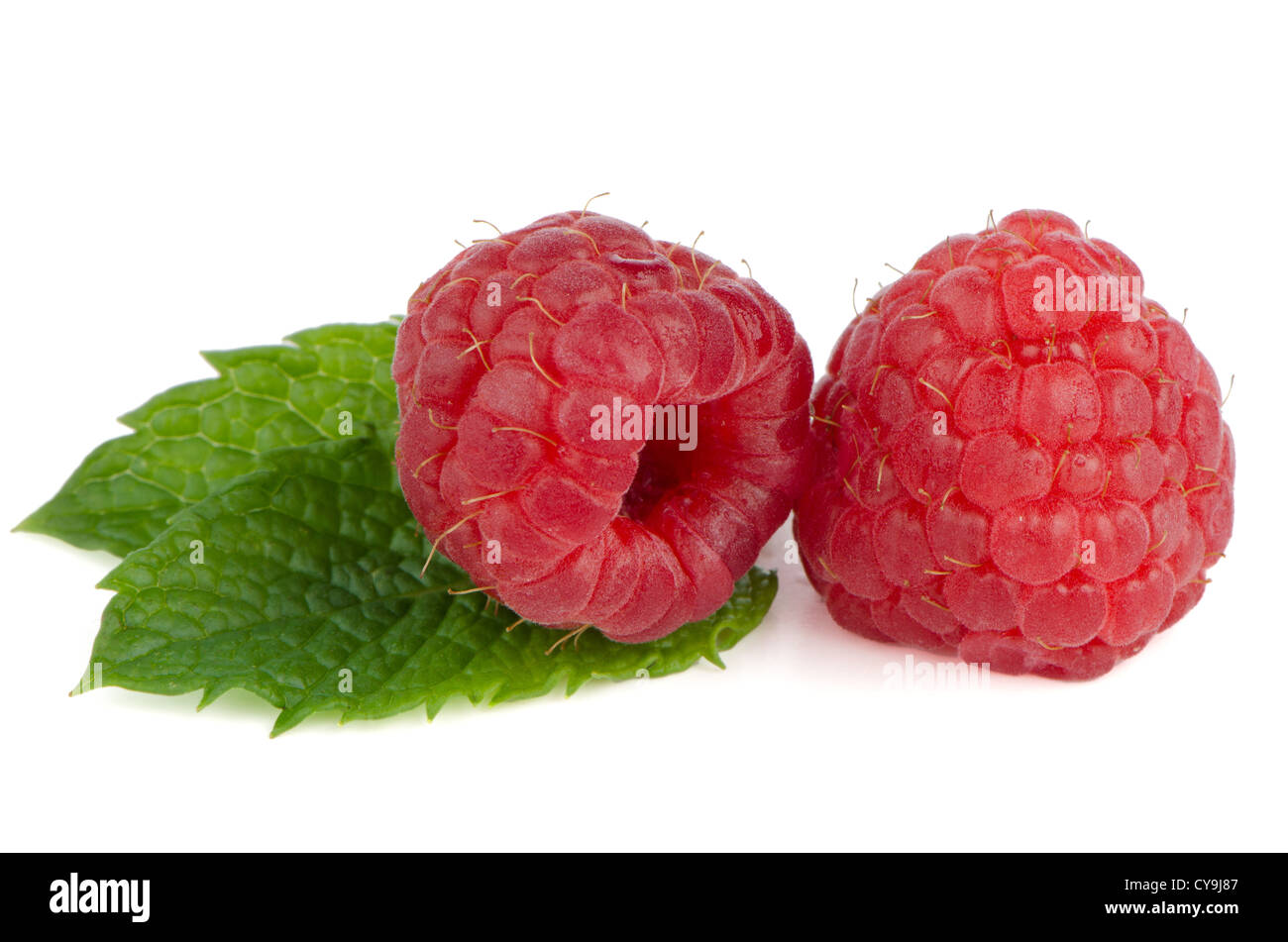 Ripe red raspberry on white background Stock Photo - Alamy