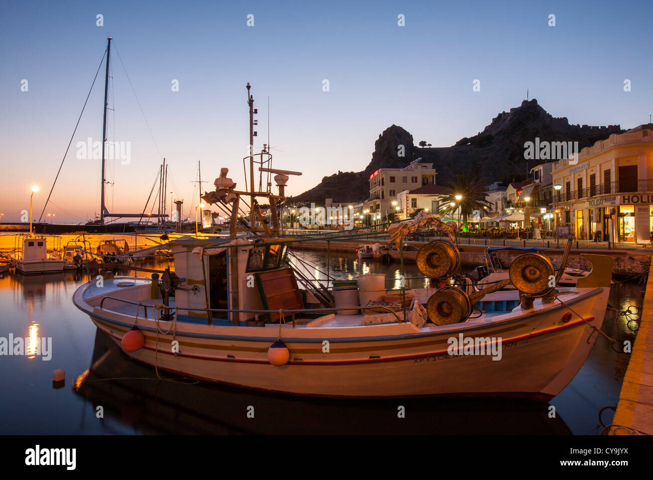 Myrina harbour with traditional small Greek fishing boats on Lemnos ...