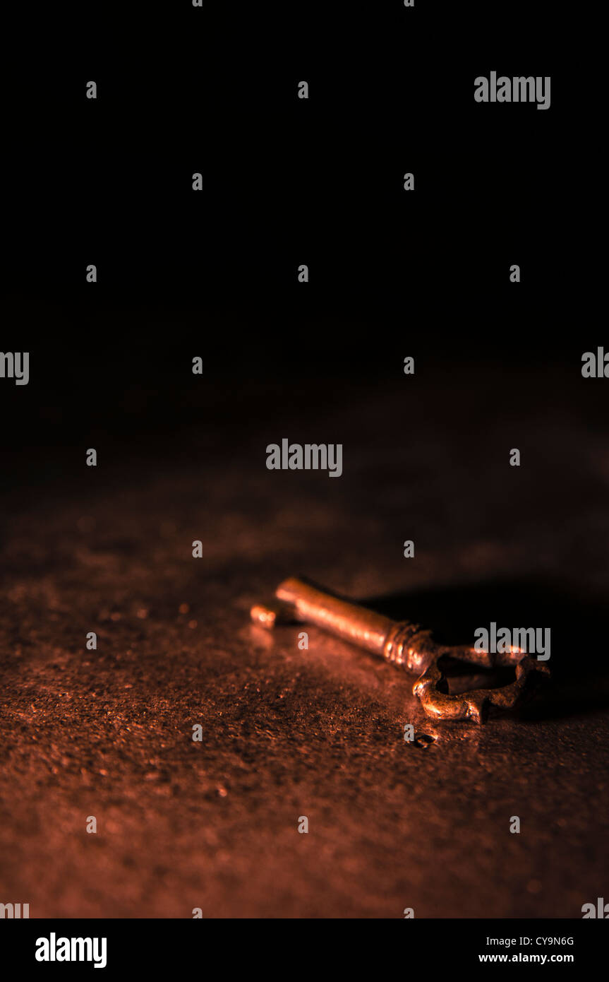 Mysterious old key Stock Photo - Alamy