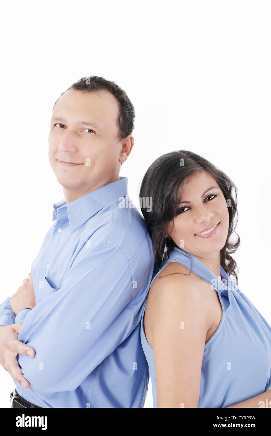 Latin couple smiling isolated on a white background Stock Photo - Alamy