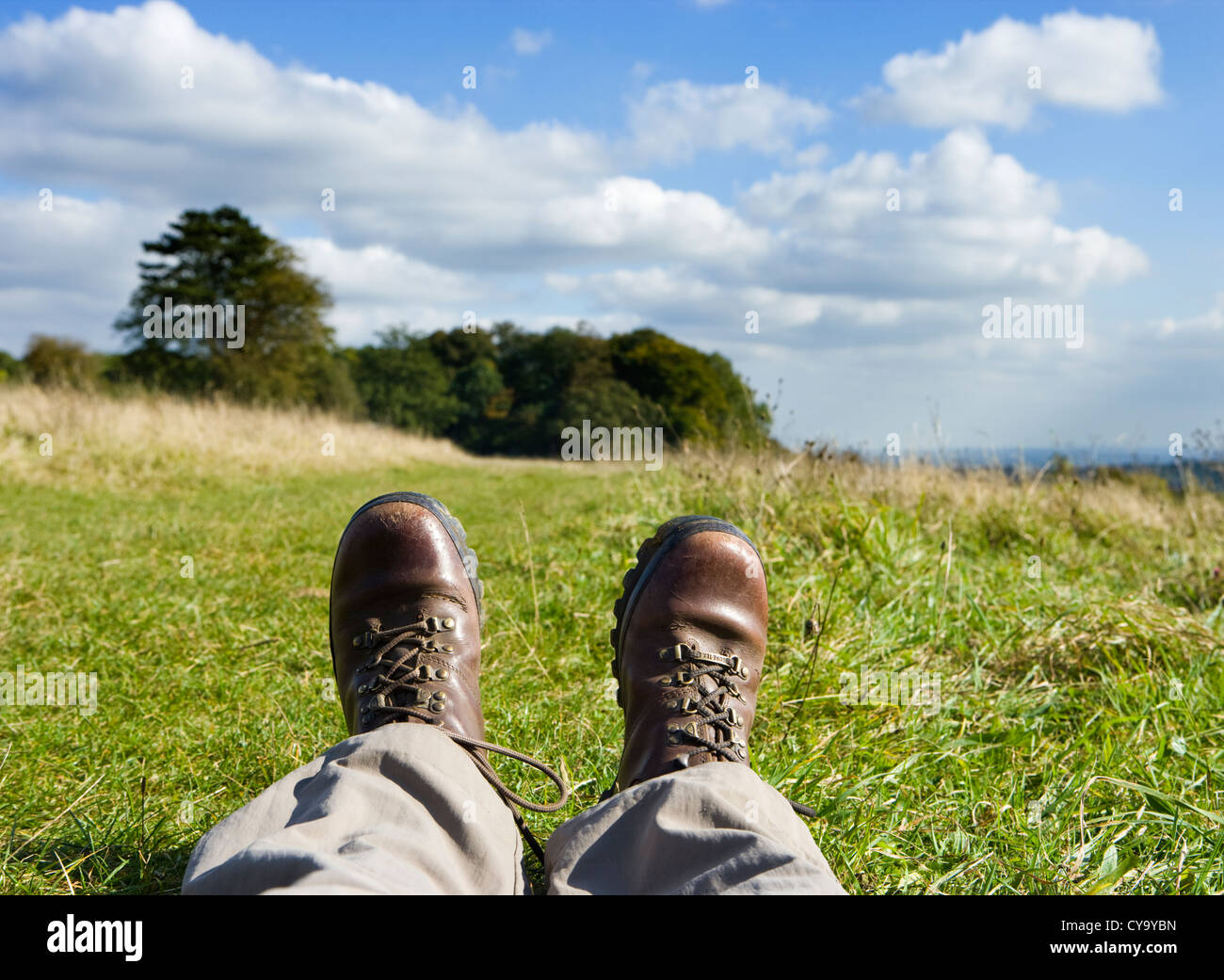 Person laying in hiking boots Stock Photo - Alamy
