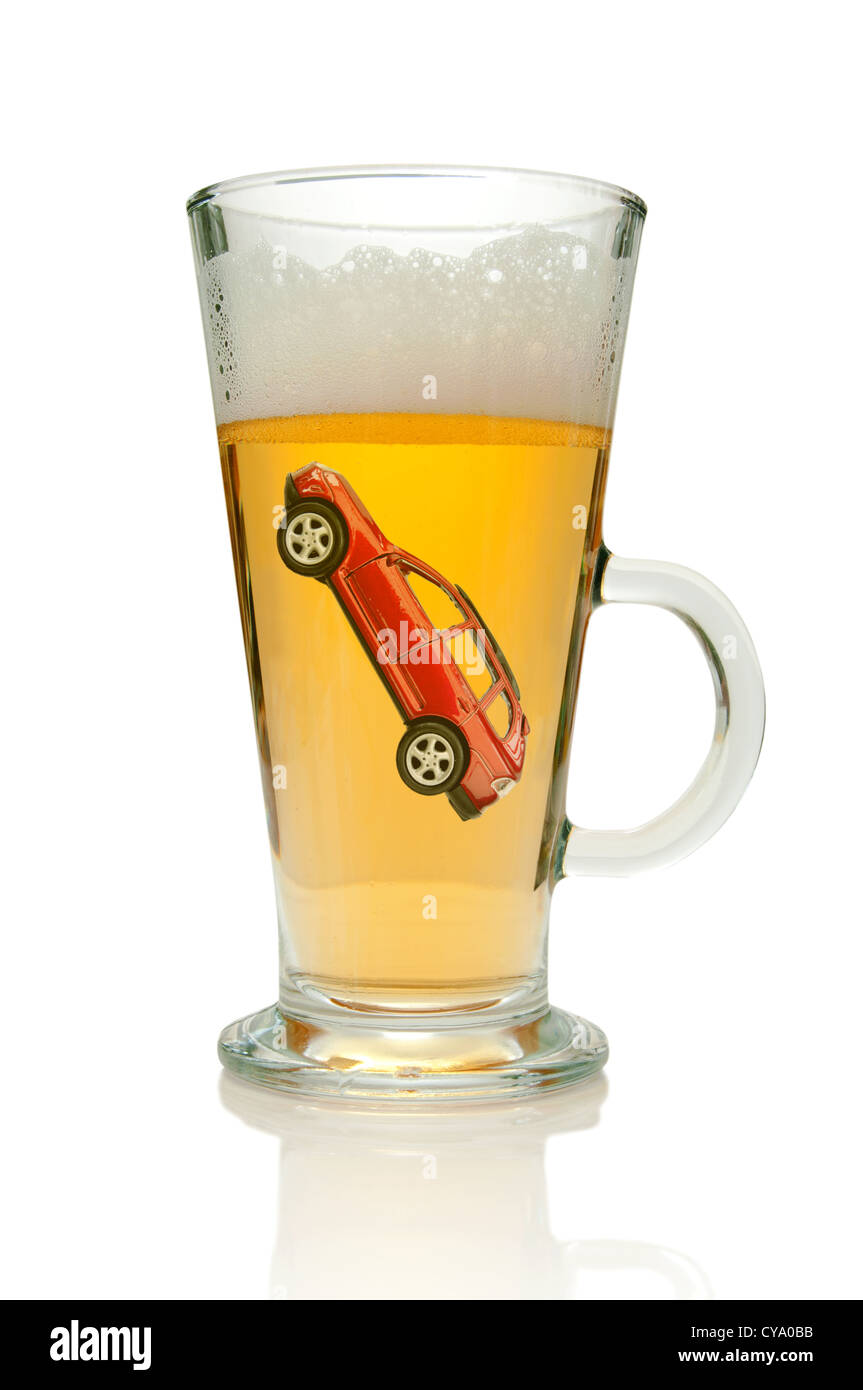 Drink driving concept. Vehicle inside a glass of beer Stock Photo - Alamy