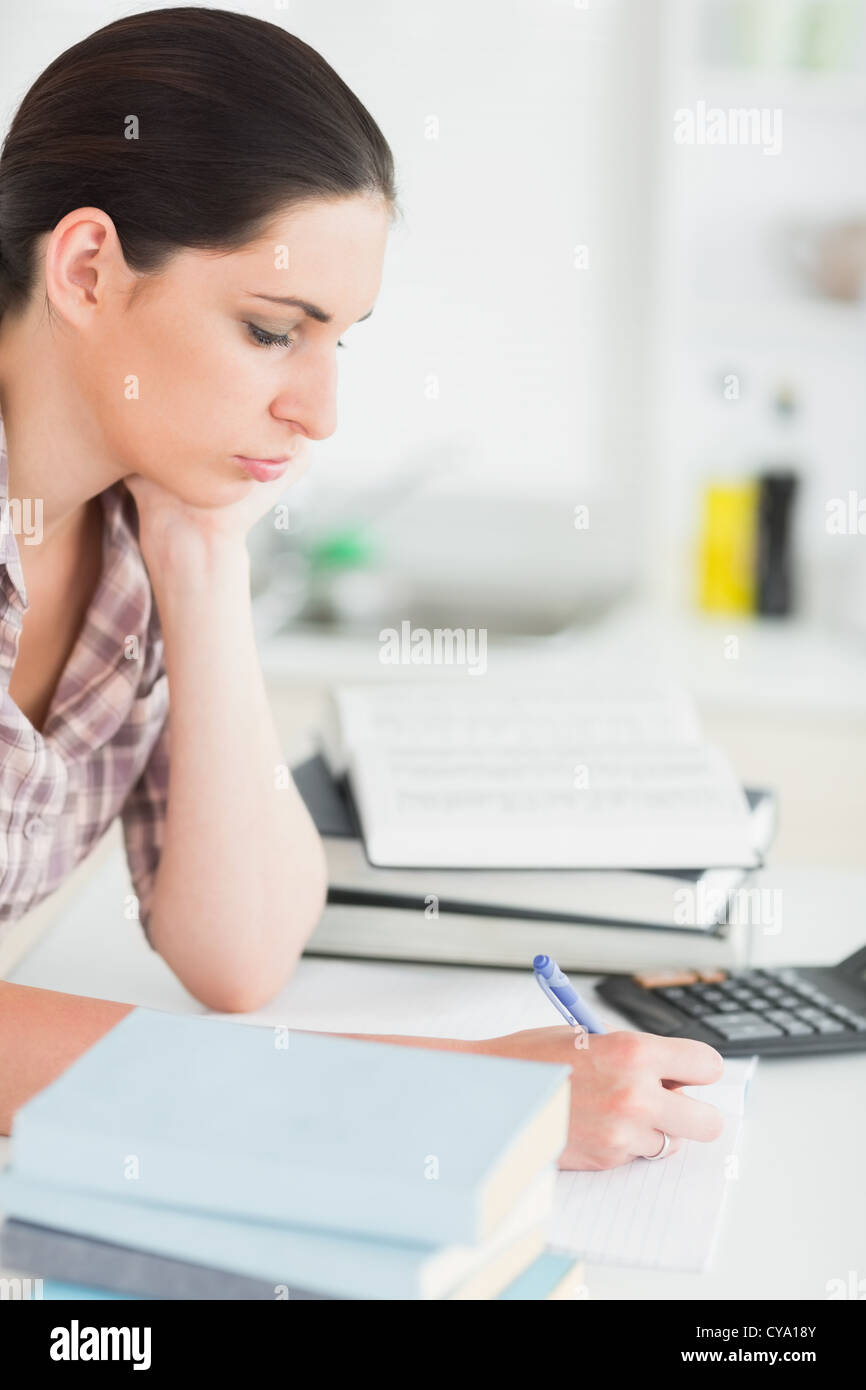 Serious woman studying hard Stock Photo - Alamy