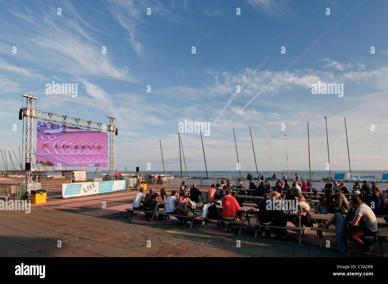 Watching the Olympics on the big screen on Brighton Beach Stock Photo ...