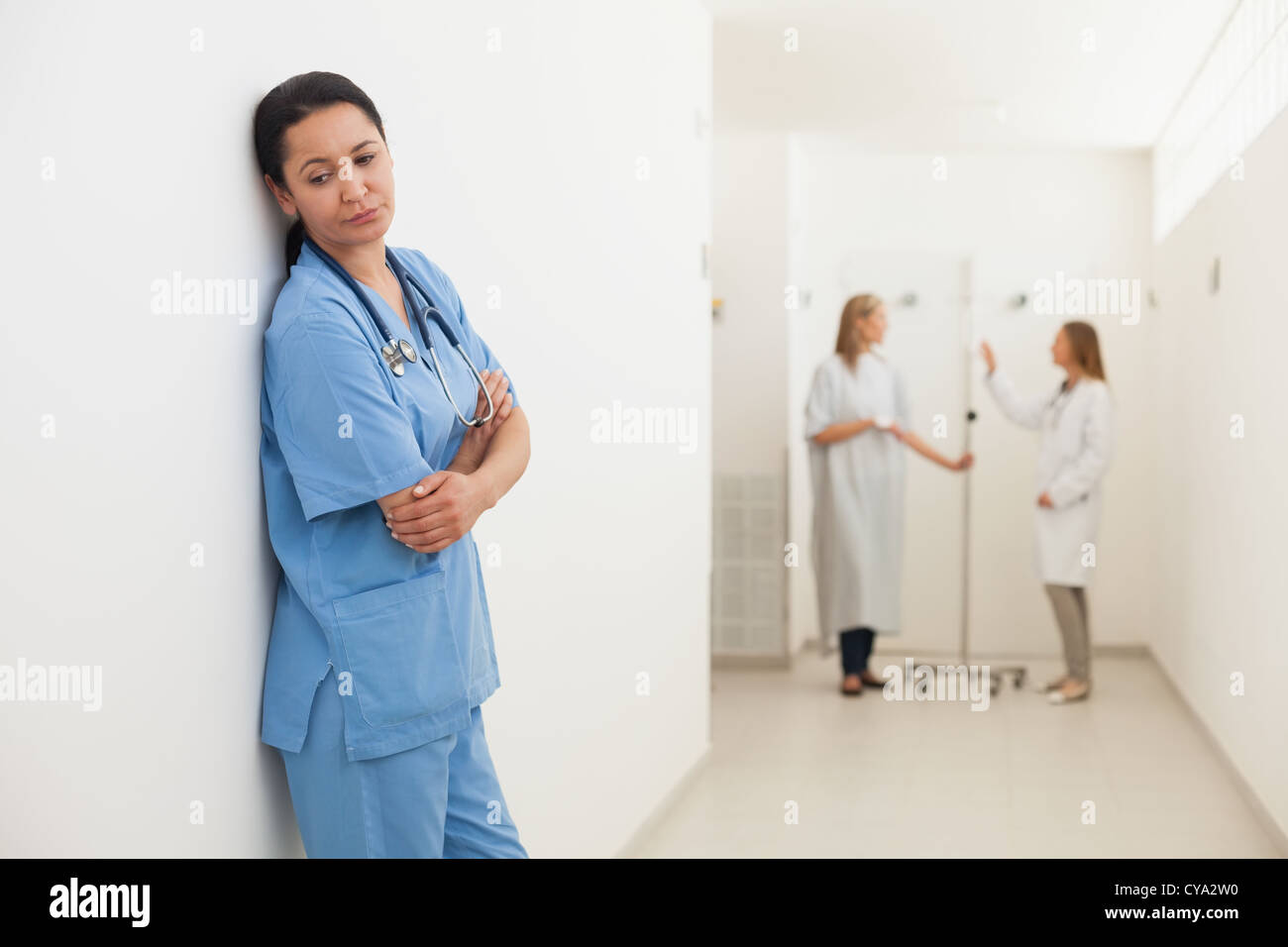 Sad nurse hi-res stock photography and images - Alamy