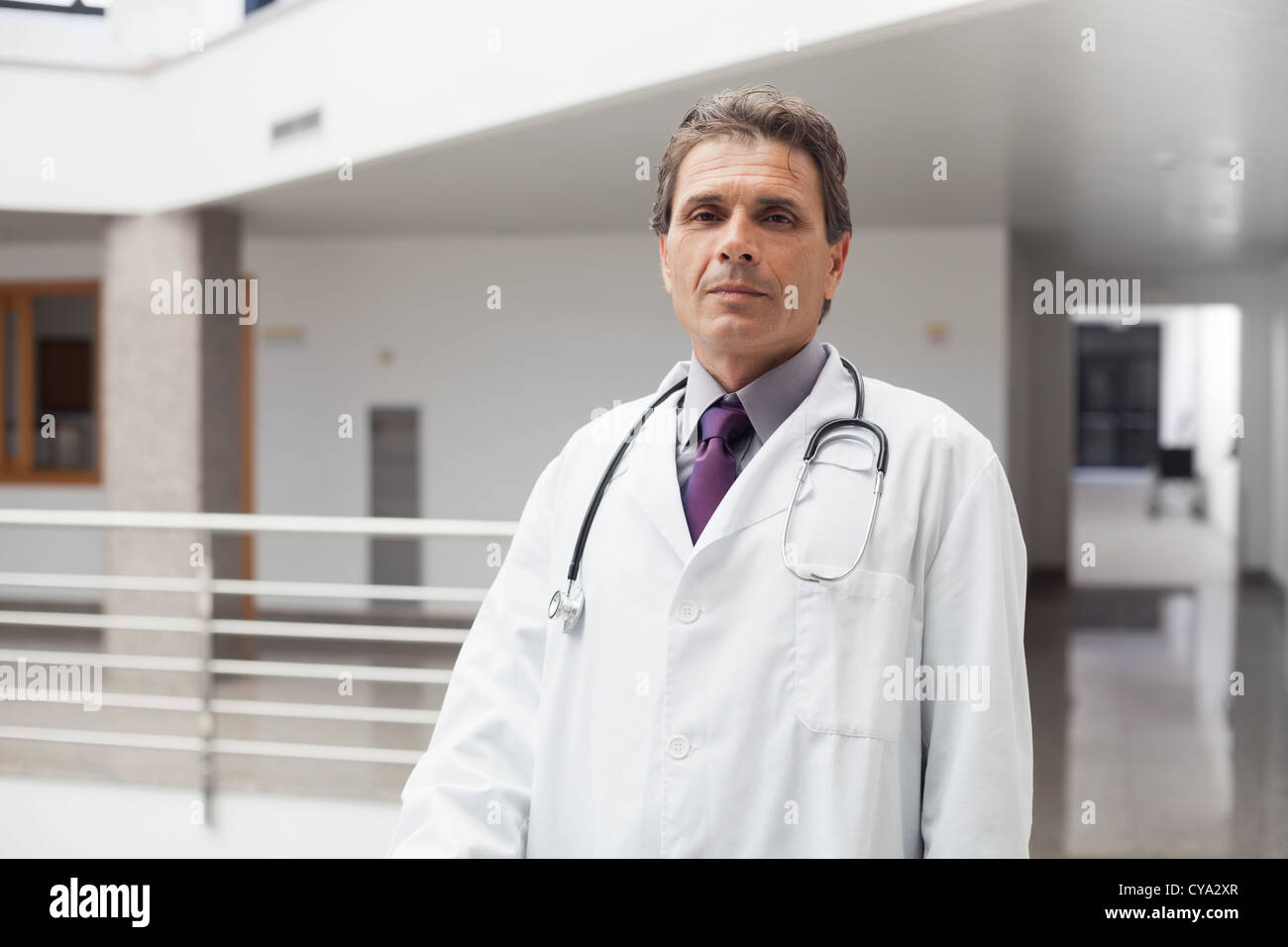 Doctor looking serious Stock Photo - Alamy