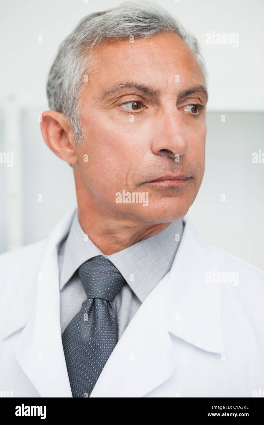 Doctor looking away Stock Photo - Alamy