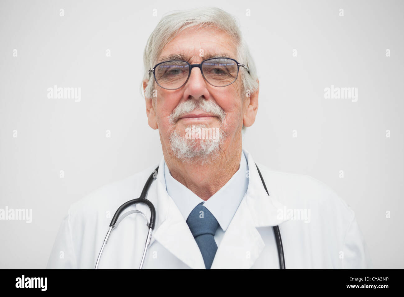 Happy bearded doctor Stock Photo - Alamy