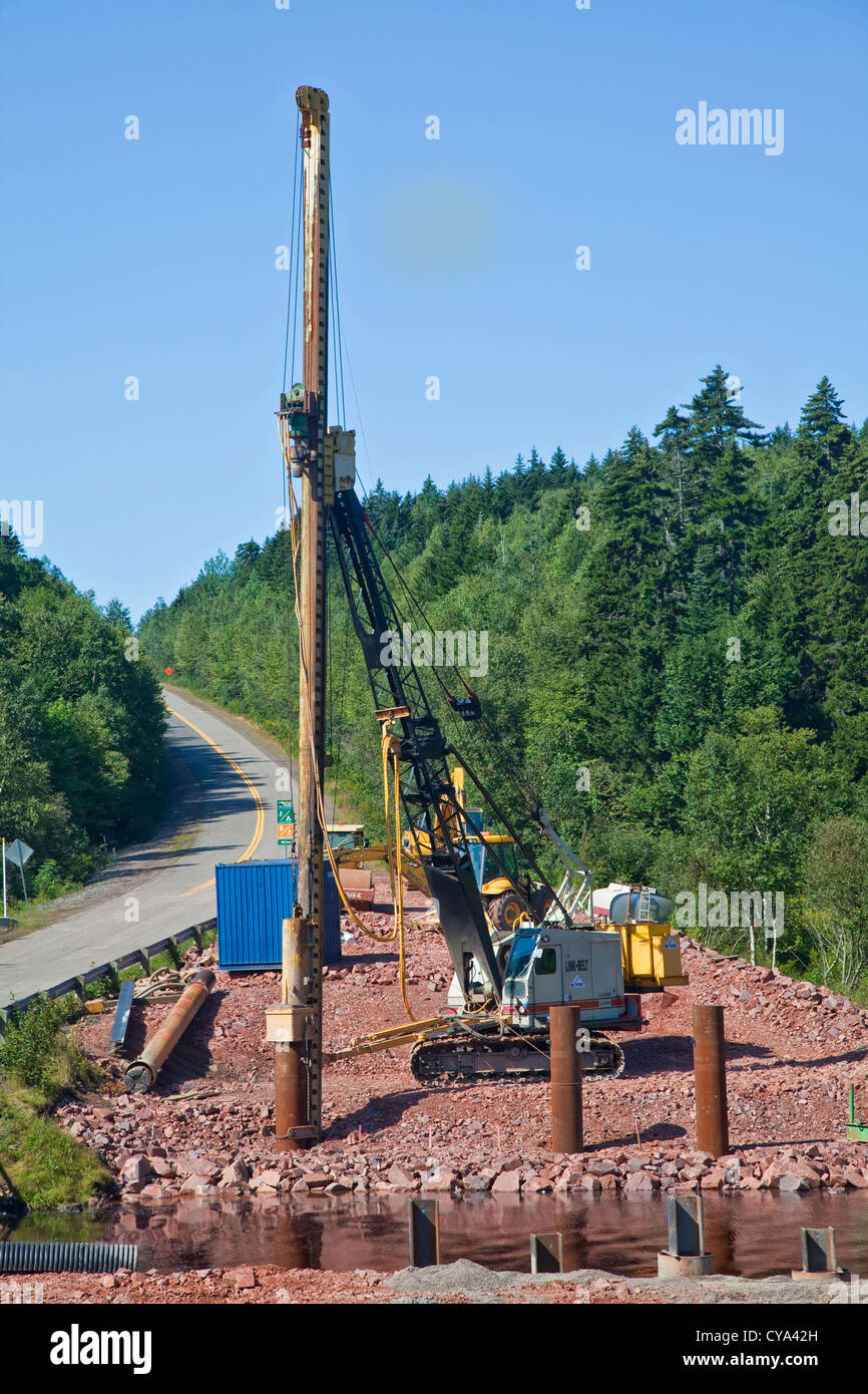 Construction of a bridge over a rural river Stock Photo - Alamy