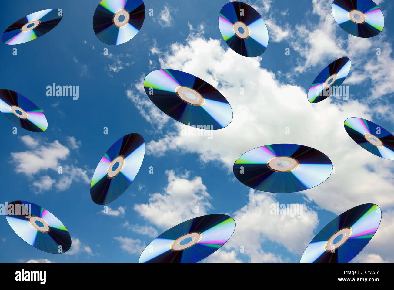 Dvd's flying in the sky Stock Photo - Alamy