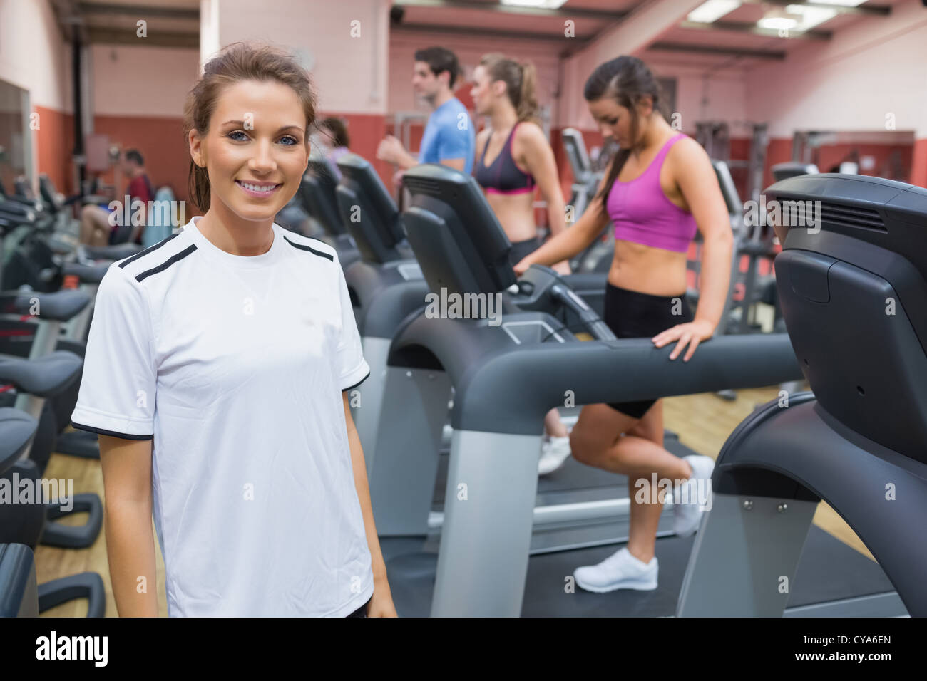 Woman smiling in the gym Stock Photo - Alamy