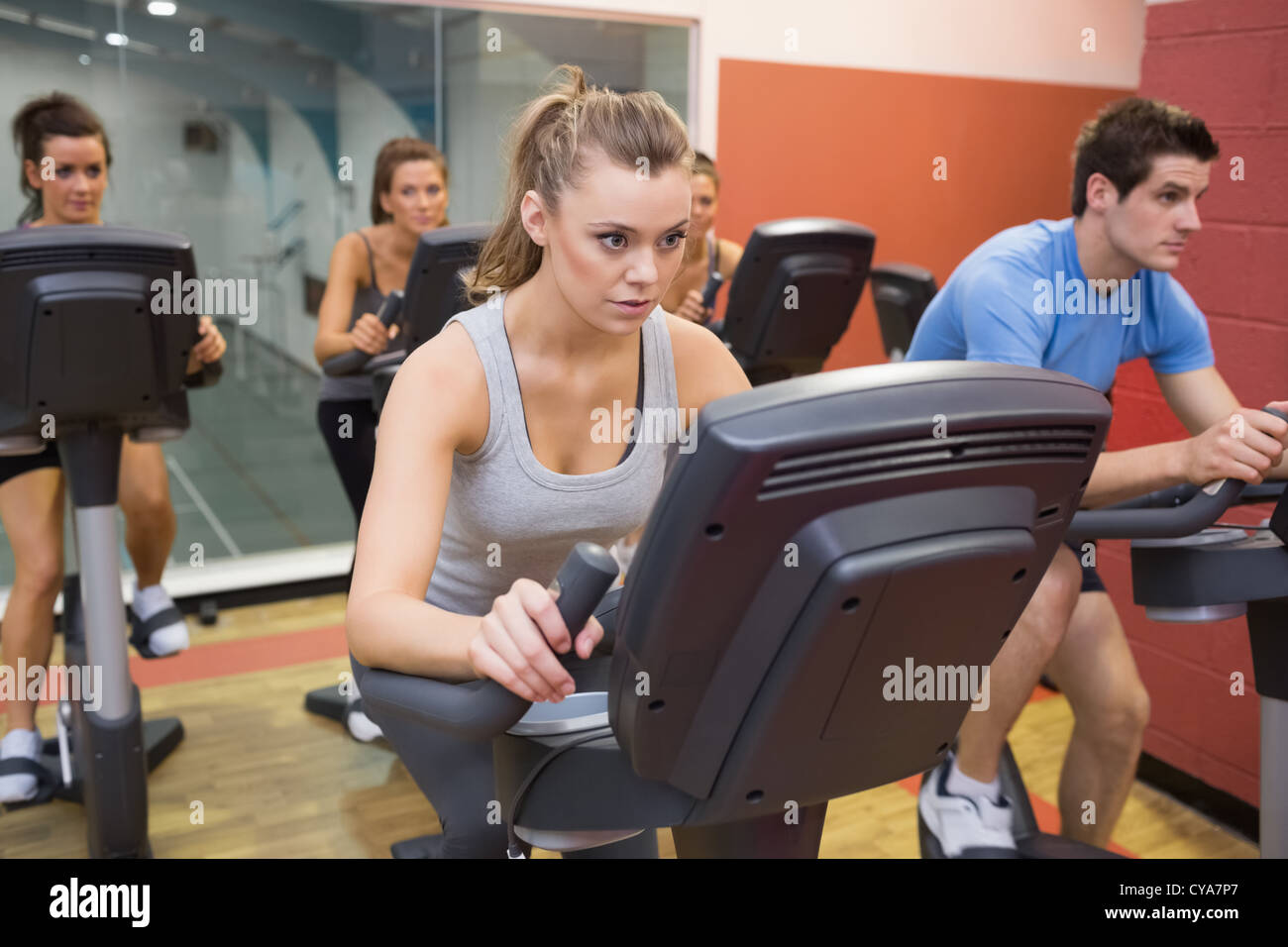People working out at spinning class Stock Photo - Alamy