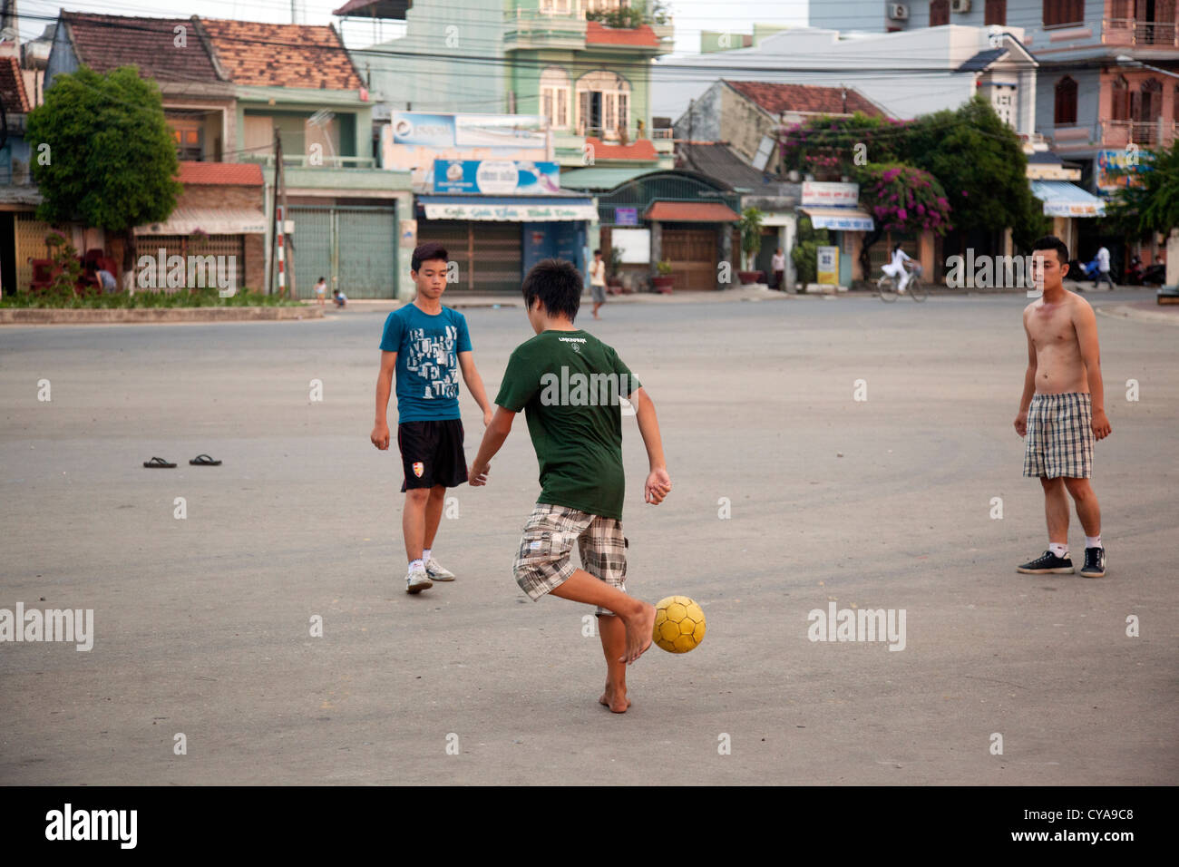 Local boys playing football Stock Photo - Alamy