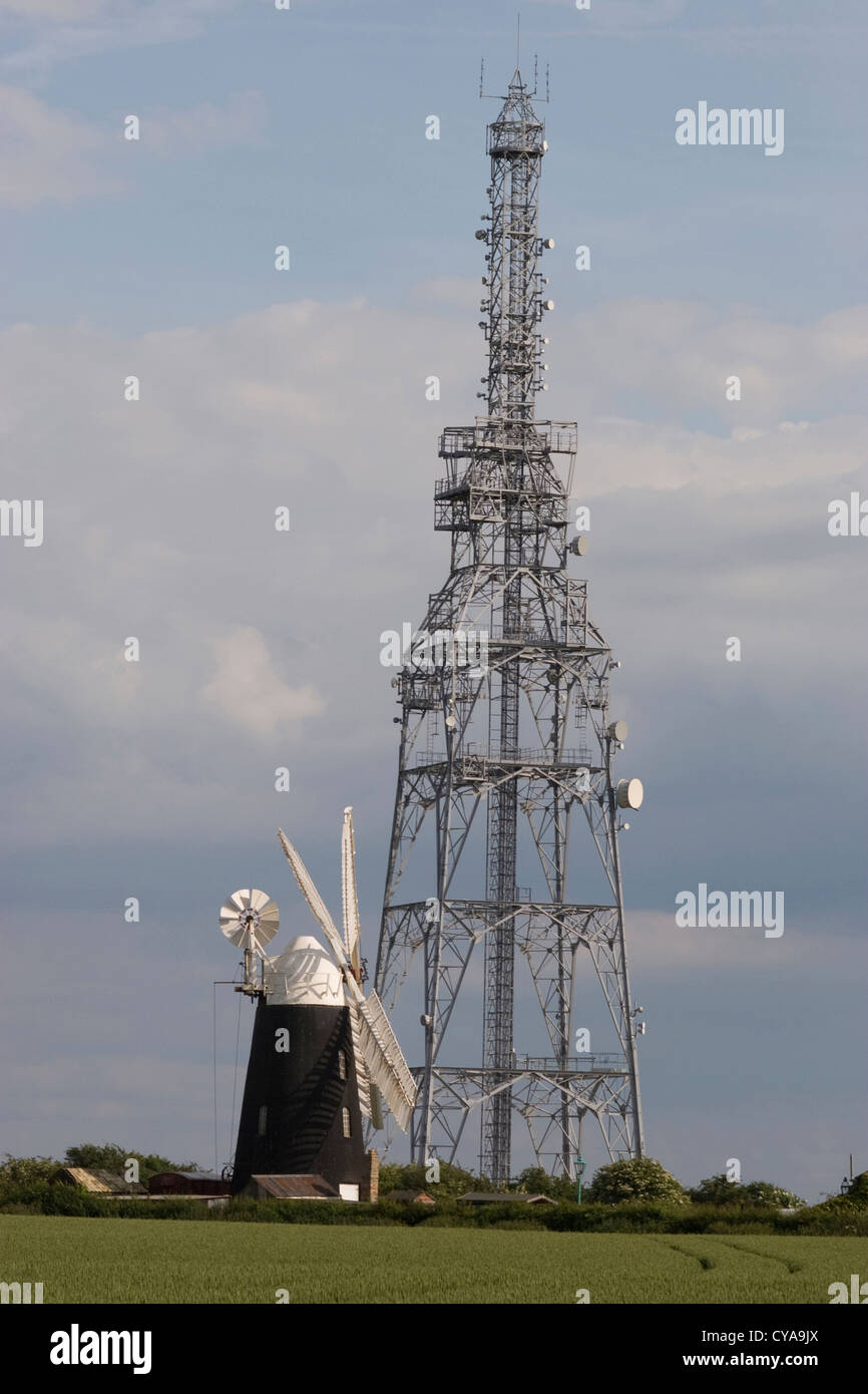 restored tower mill at Over, Cambridgeshire, contrasting with radio ...