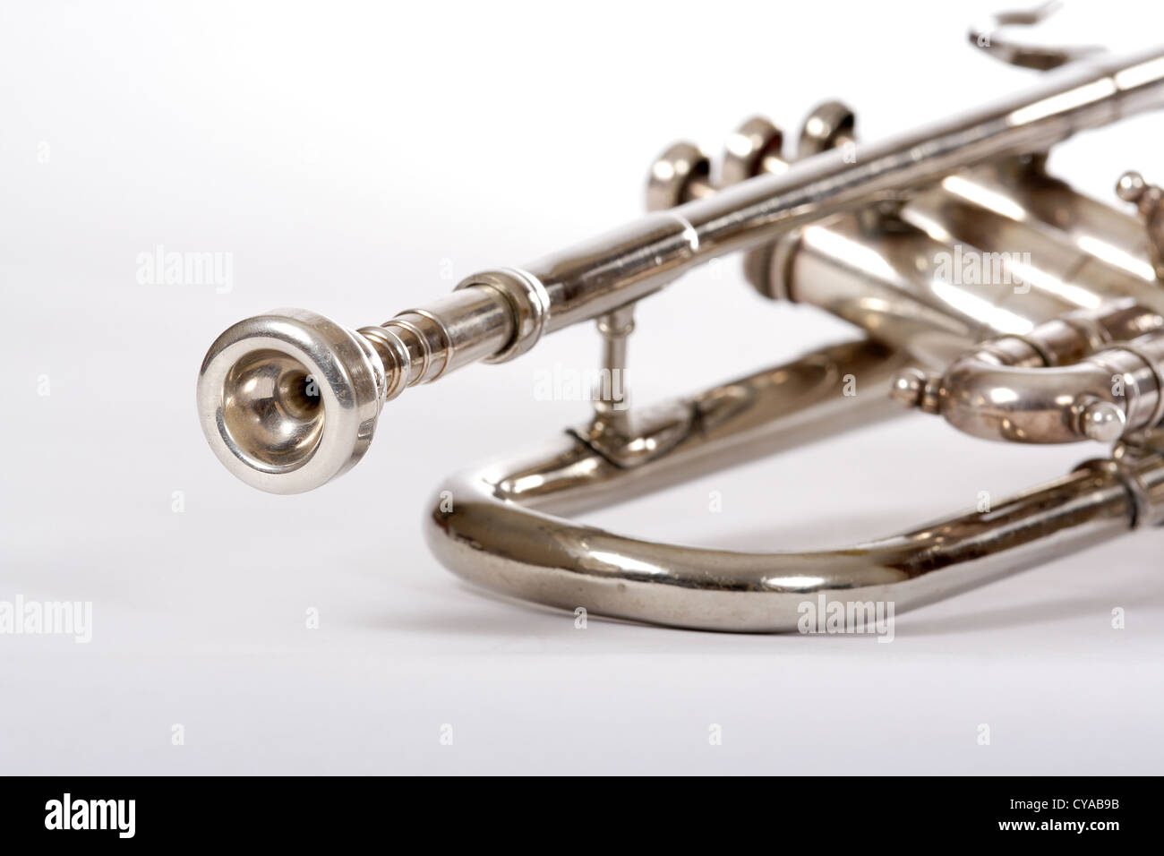 Old trumpet photo on the white background Stock Photo - Alamy