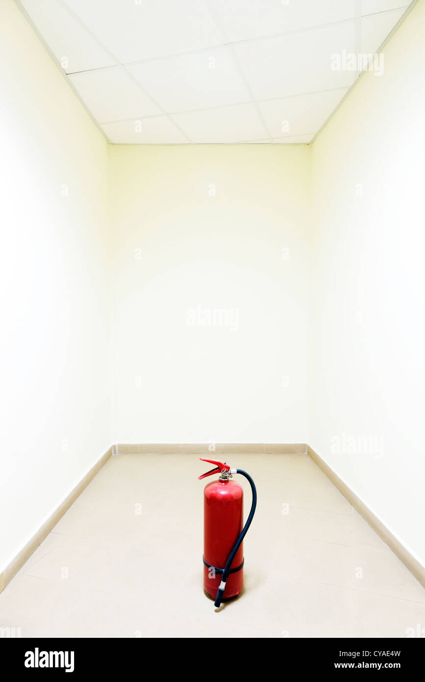 empty room with fire extinguisher Stock Photo - Alamy