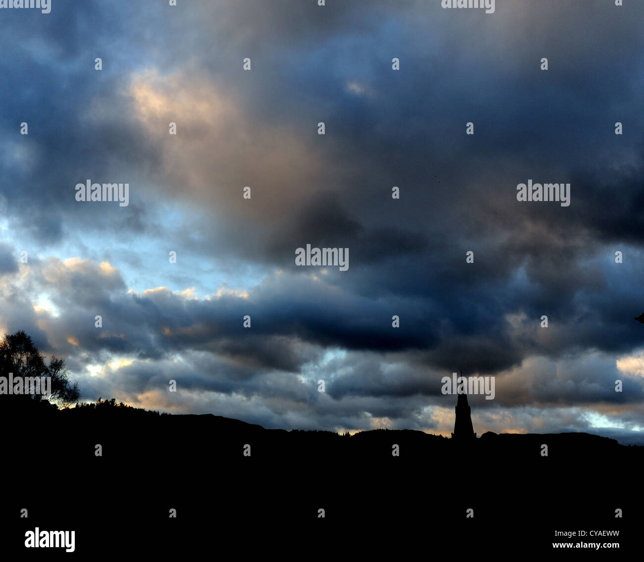 Dramatic sky with black cloud formation over town of Ambleside in the ...