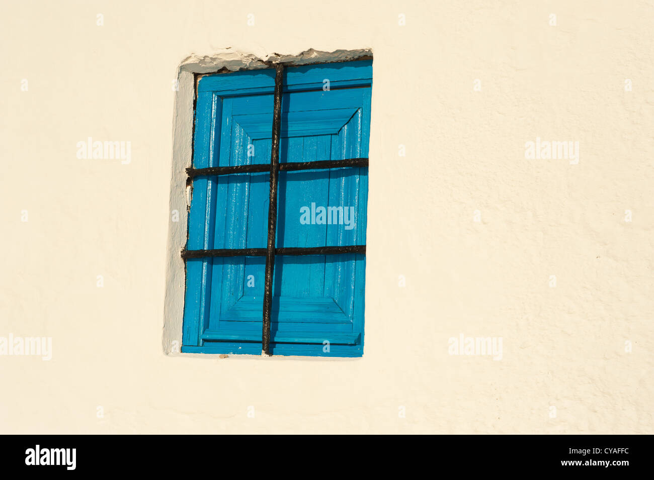 Blue painted window on white facade, Mediterranean colors Stock Photo ...