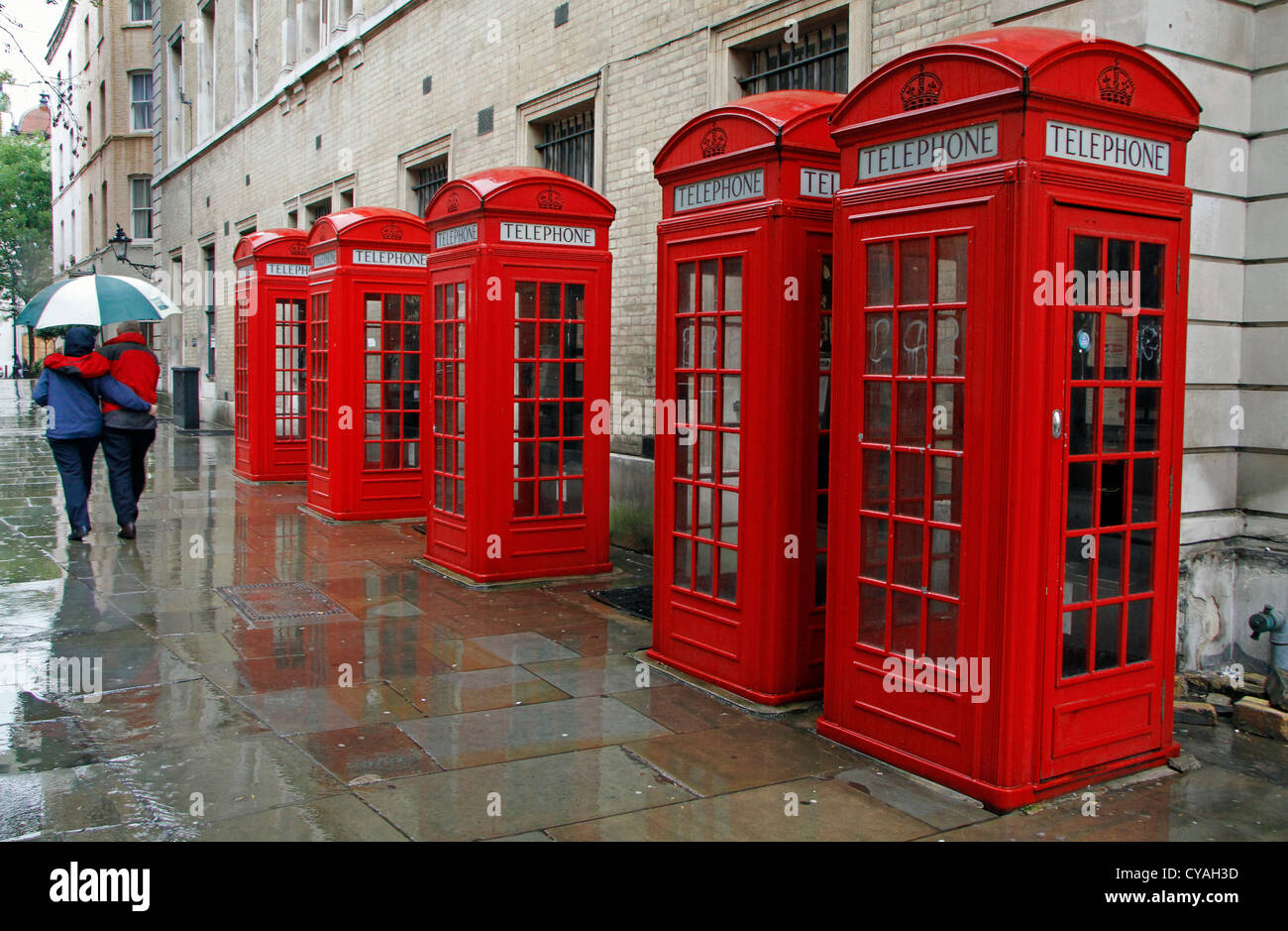 Ringing in the Rain, A wet day in London showing the iconic telephone ...