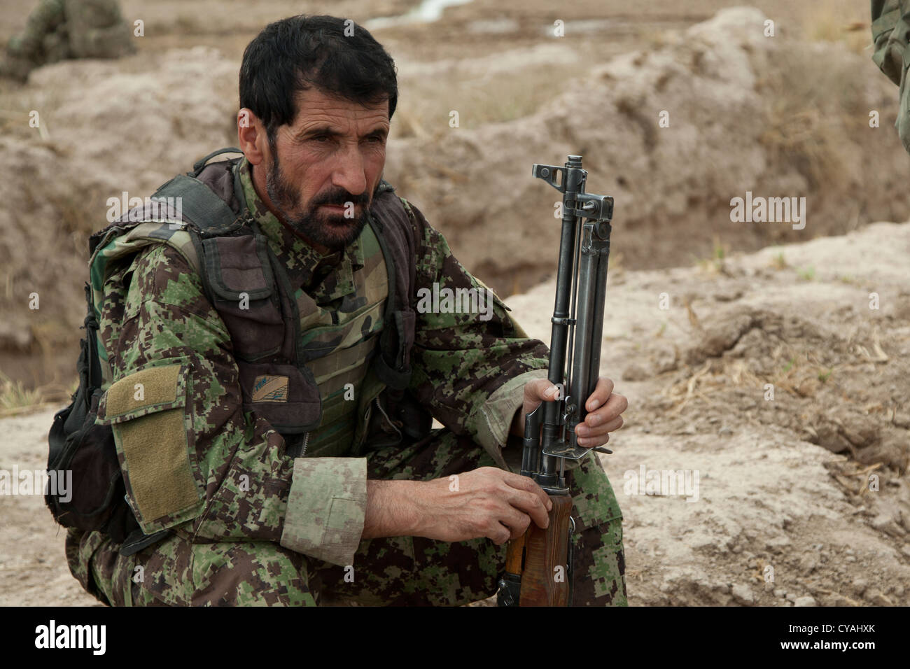 An Afghan National Army commander rests during an Afghan National ...