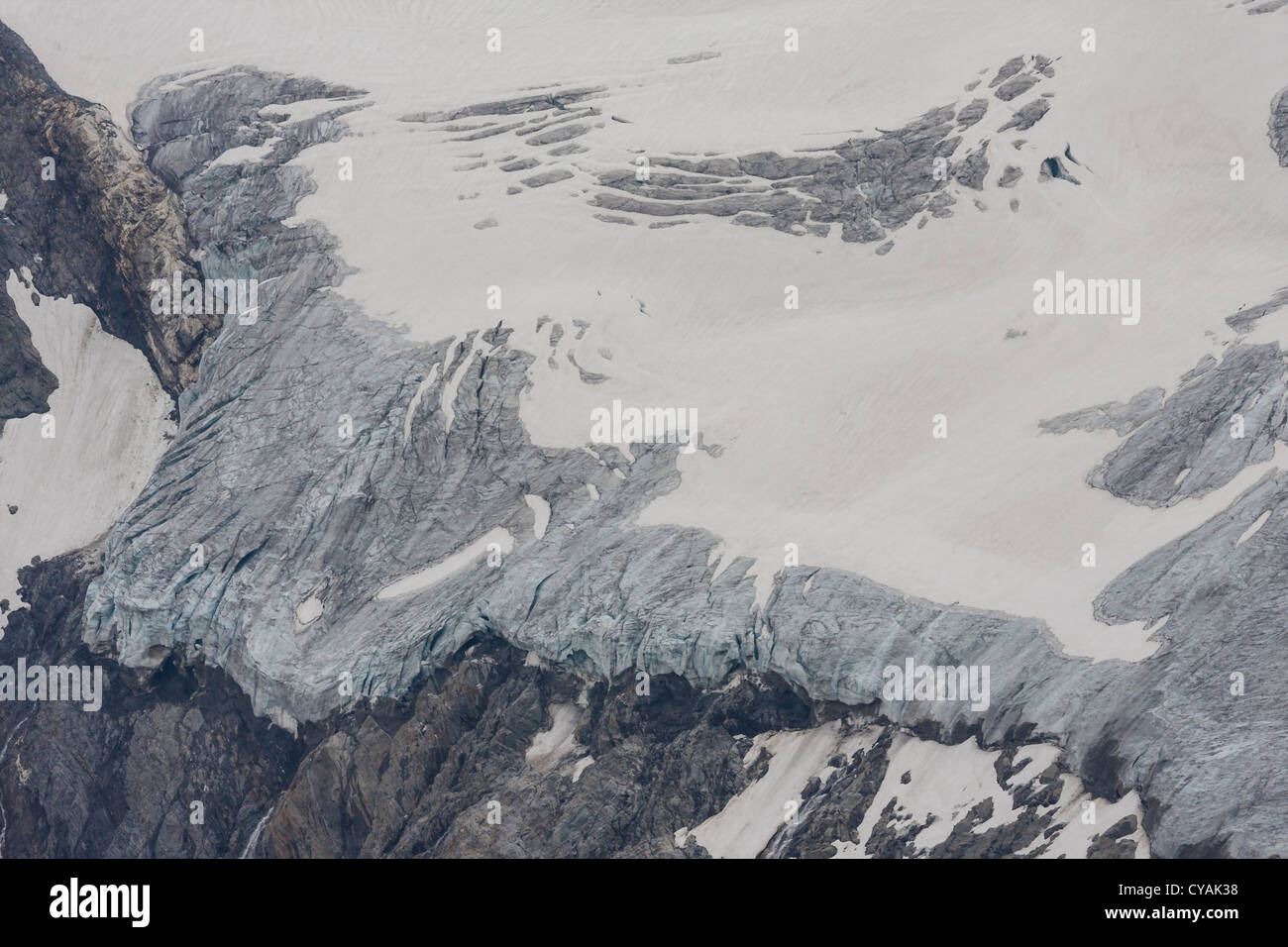 A patch of glacier ice showing through the previous years winter snow ...