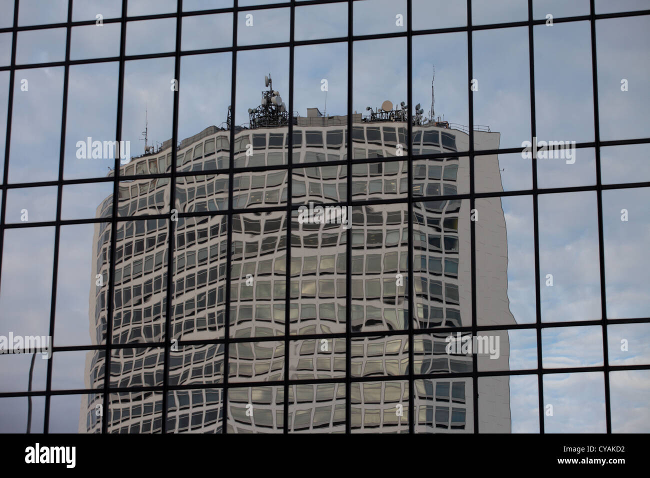 Building reflected in the glass windows of another building, Birmingham ...