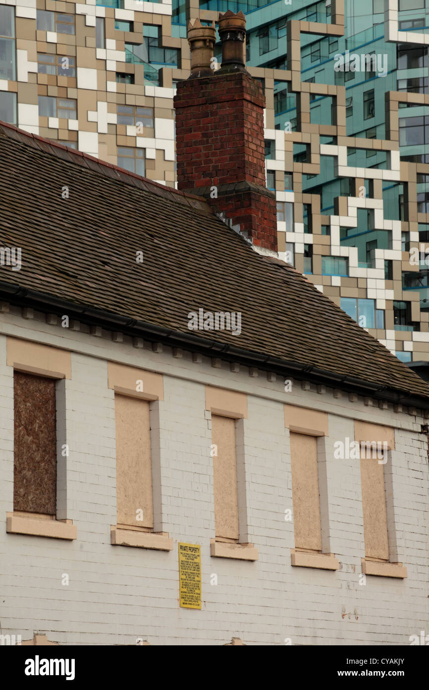 Old buildings overshadowed by newer twentieth century architecture in ...