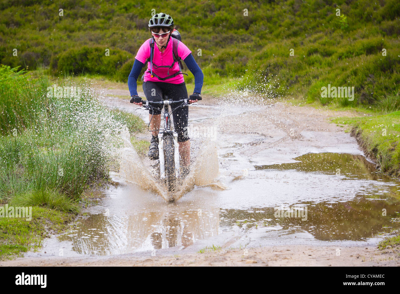 Splashing through the puddle hi-res stock photography and images - Alamy