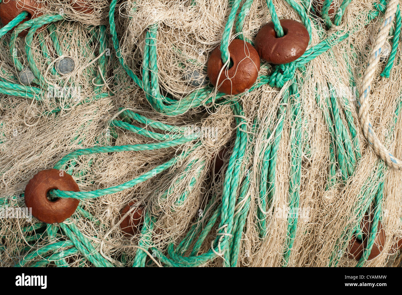 Beige color fishing nets background Stock Photo - Alamy