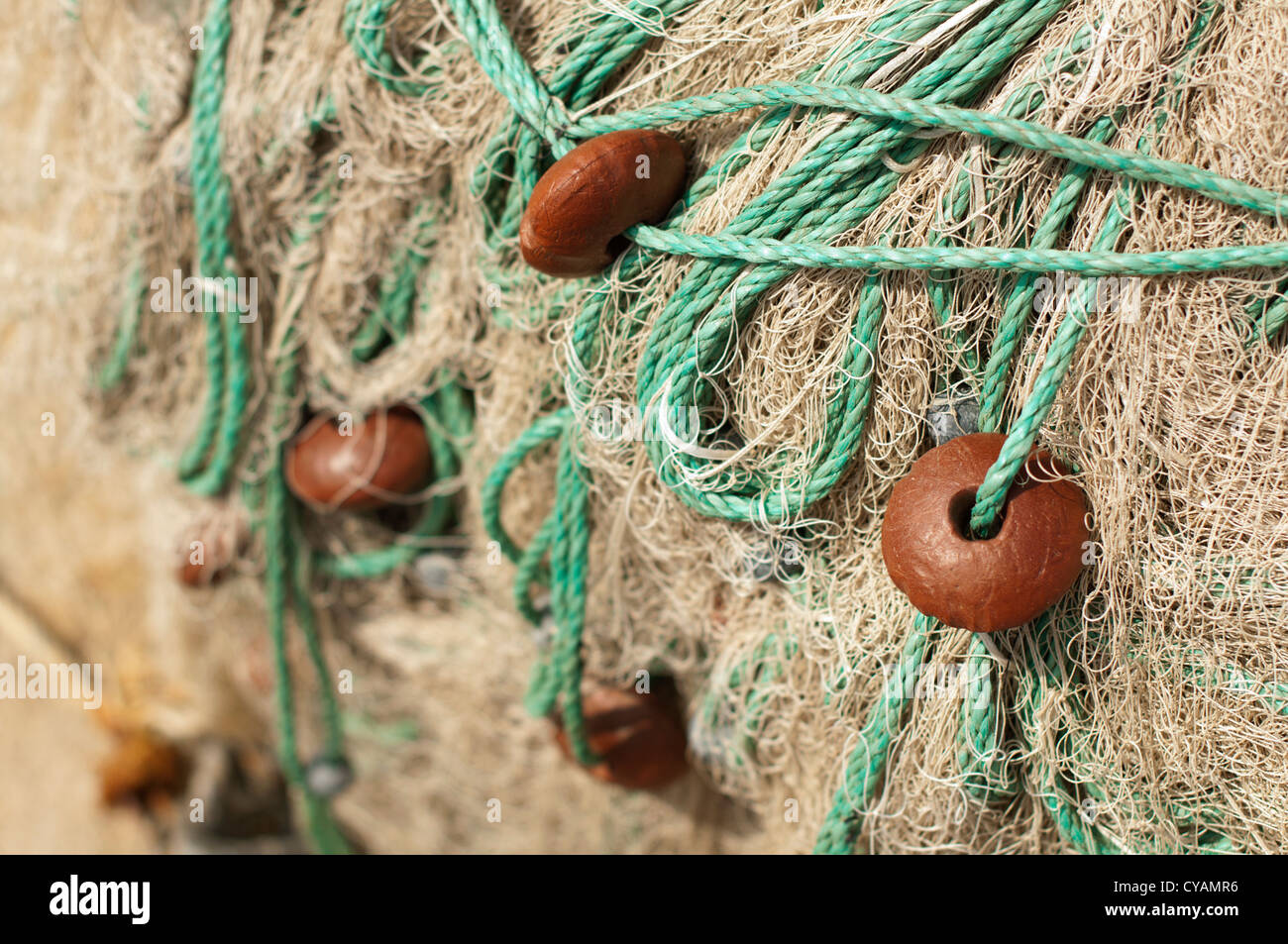 Beige color fishing nets background Stock Photo - Alamy