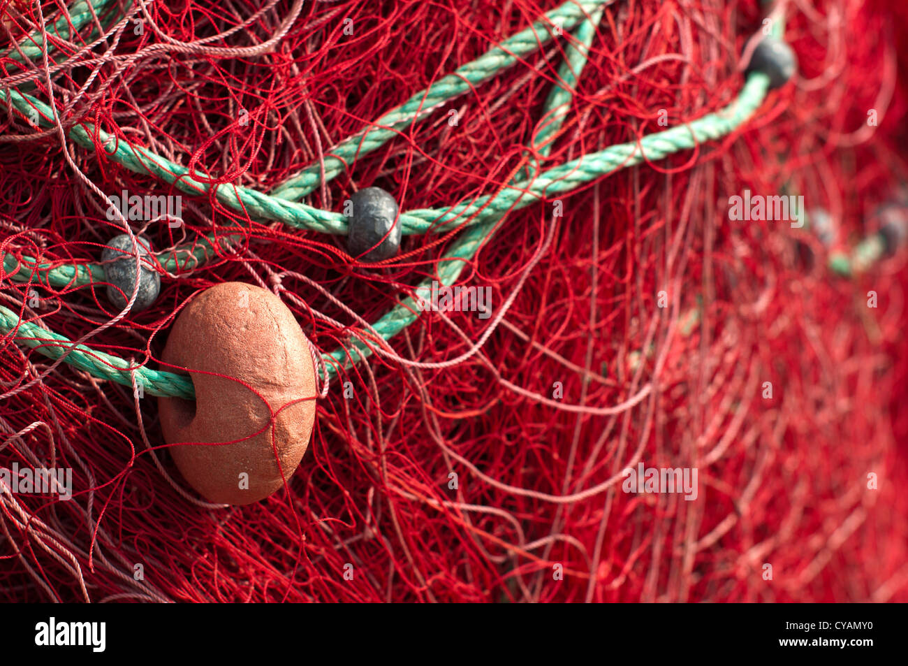 Red color fishing nets background Stock Photo - Alamy