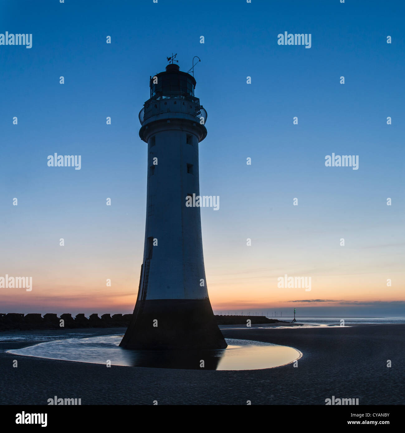 Perch Rock lighthouse at sunset Stock Photo - Alamy