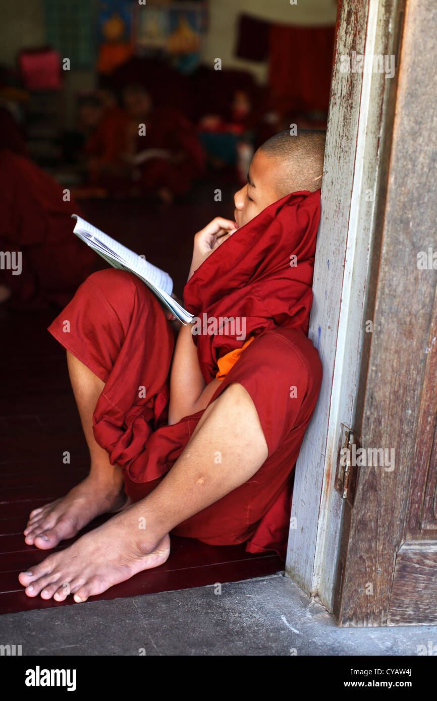 Teenage Buddhist monk studying at the monastery in Yangon, Burma Stock ...