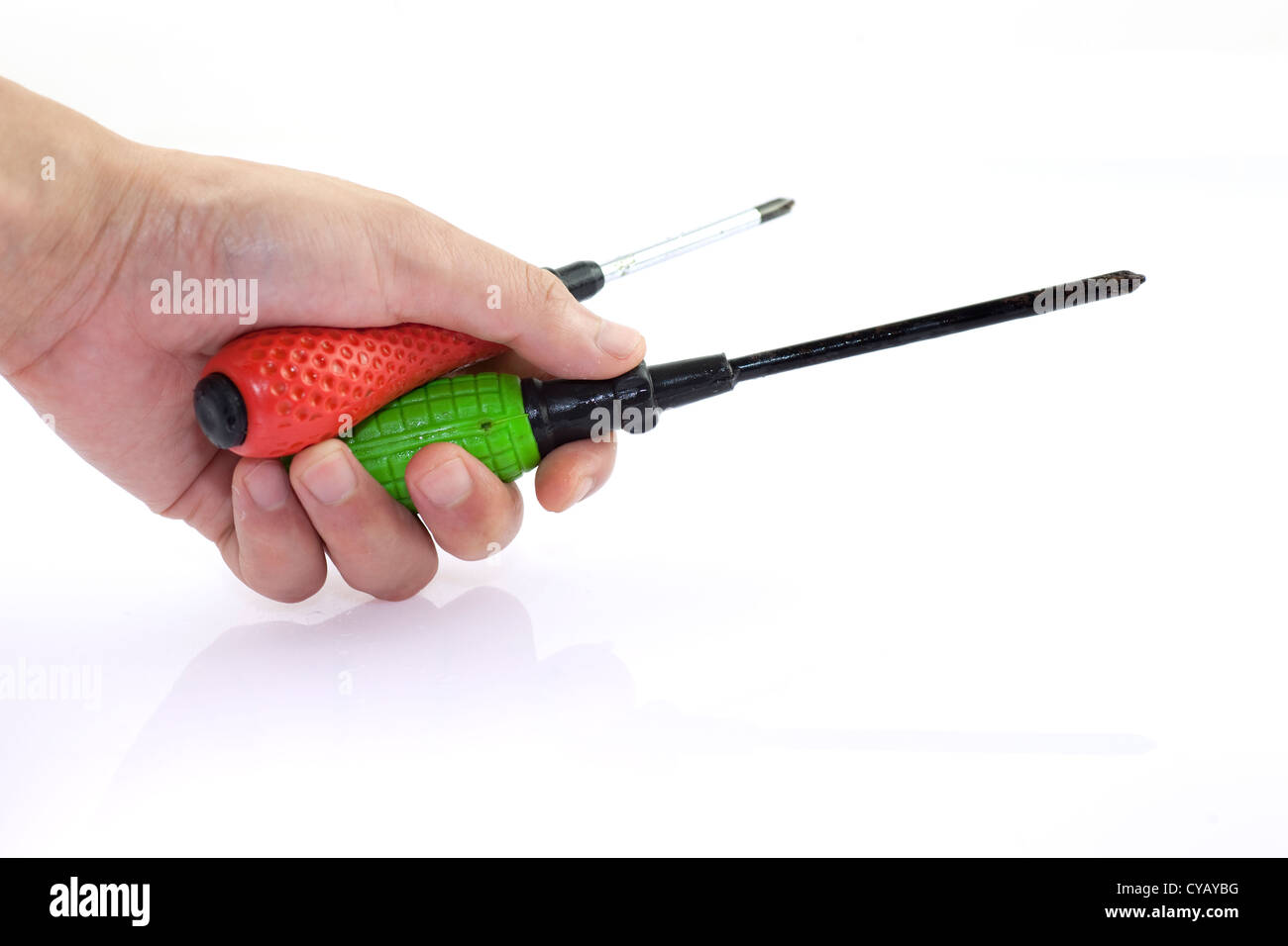 people hand holding screwdrivers on a white background Stock Photo - Alamy