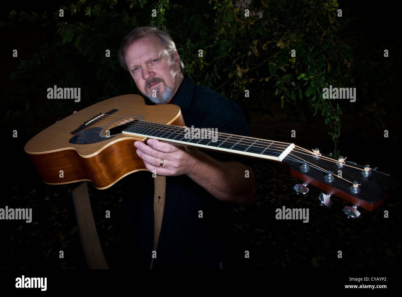 MAster musician shows his instrument Stock Photo - Alamy
