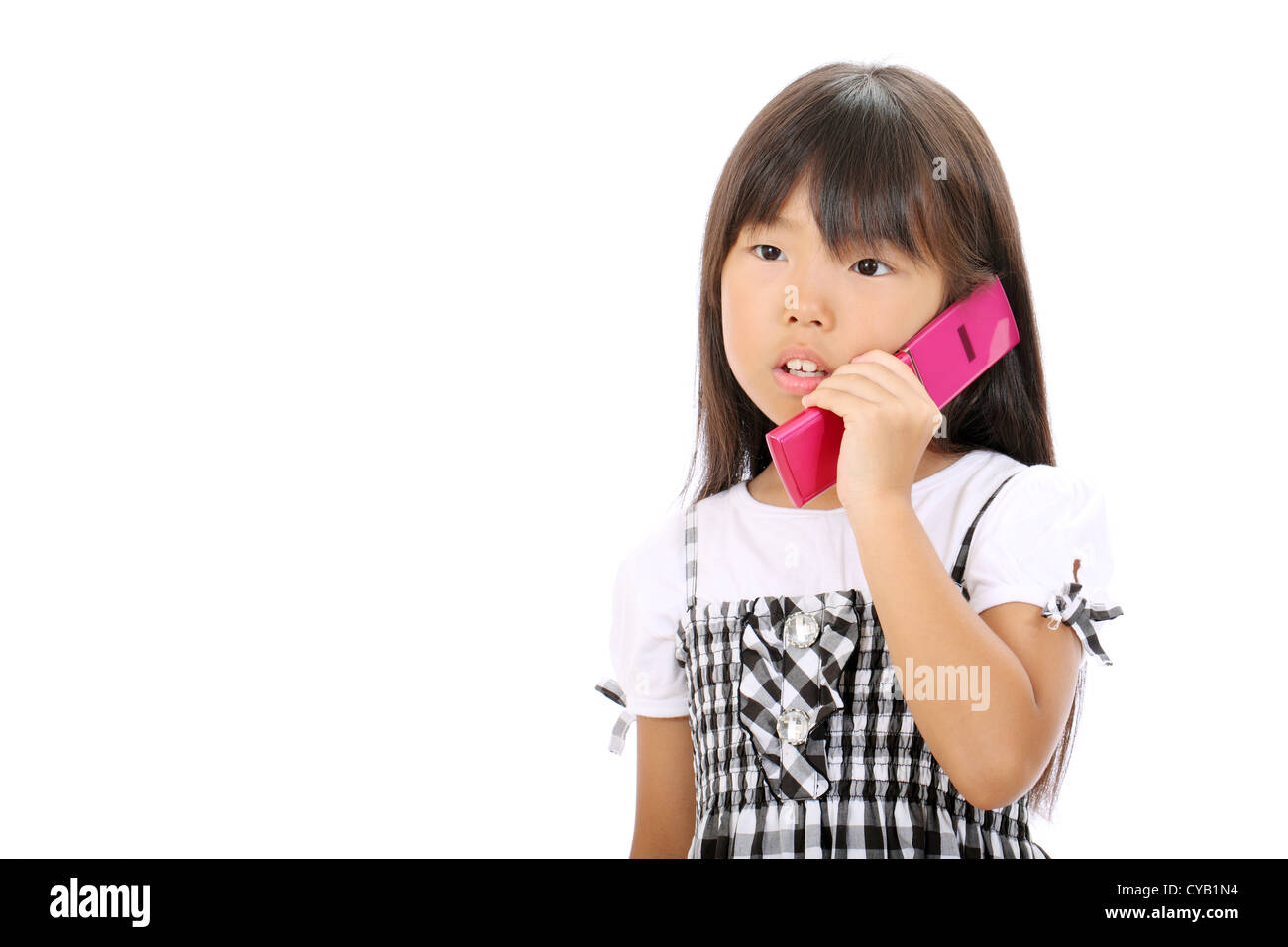 Little sad girl calling by cellular phone Stock Photo - Alamy