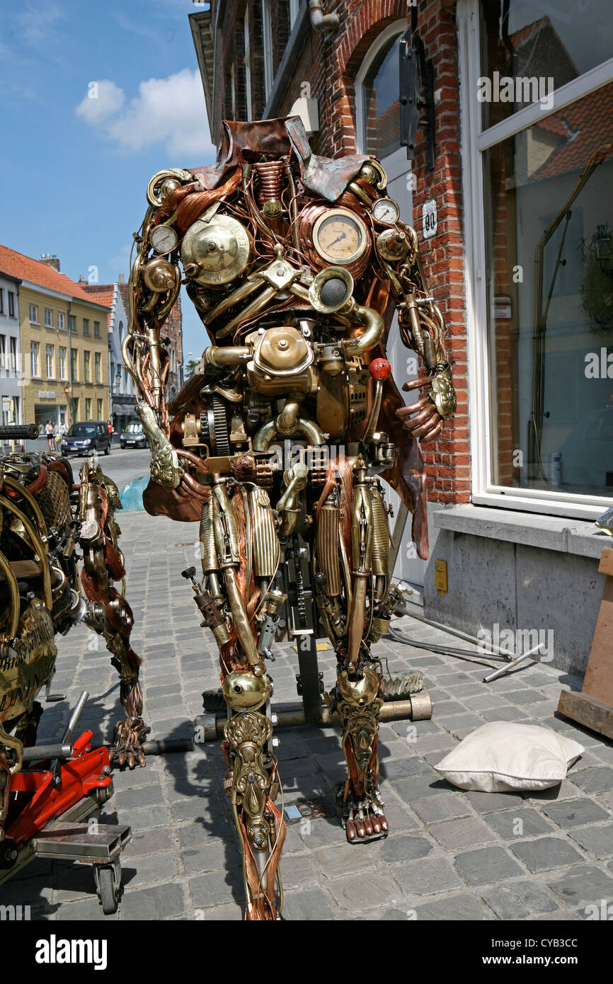 Metal Sculpture of a man in Bruges in Belgium Stock Photo - Alamy